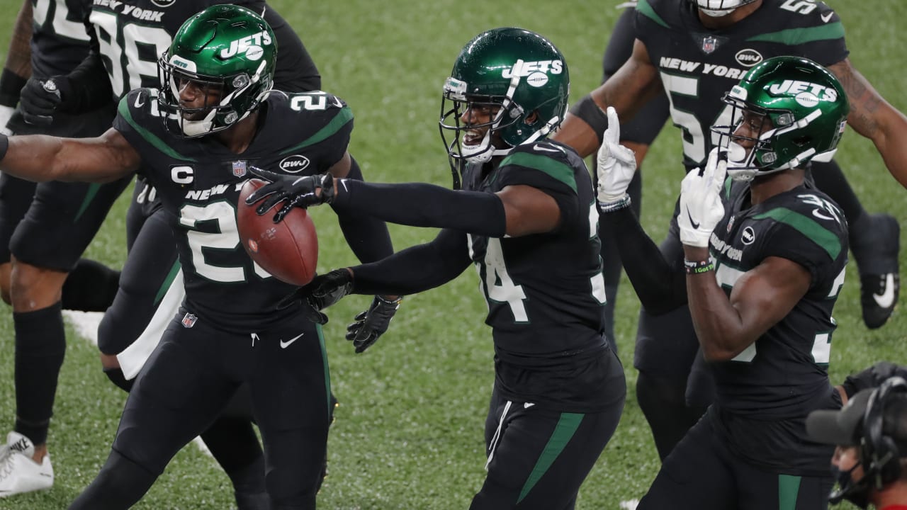 New York Jets defensive back Brian Poole reads Rypien's throw for Jets ...