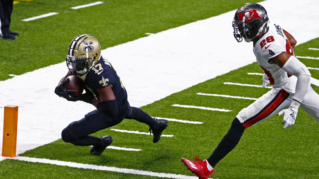 New Orleans Saints wide receiver Emmanuel Sanders slips would-be tackle ...