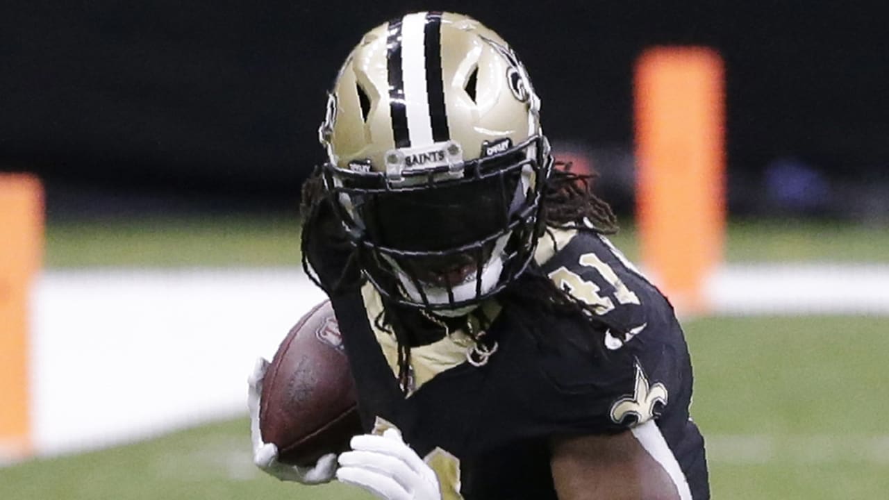 New Orleans Saints running back Alvin Kamara fights through arm-tackles ...