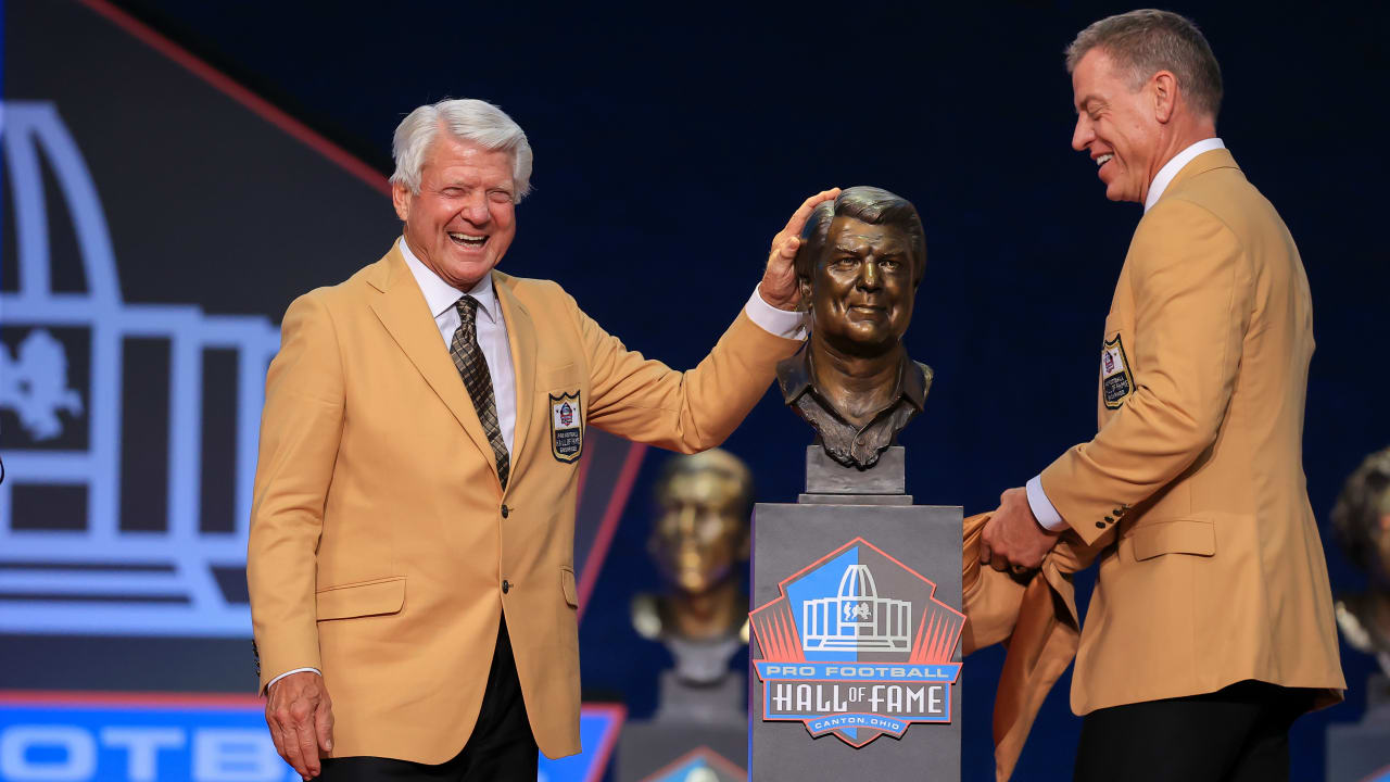 Pro Football Hall of Fame quarterback Troy Aikman presents former NFL head coach Jimmy Johnson ...
