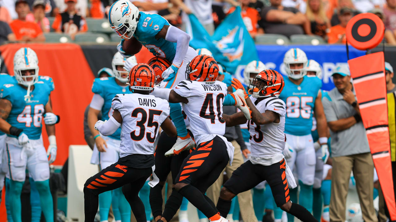 Miami Dolphins wide receiver Kirk Merritt snags a high fastball from ...