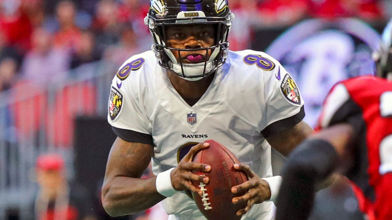 Ravens QB Lamar Jackson returns after kick to head