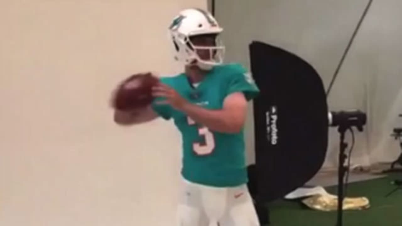 Miami Dolphins quarterback Josh Rosen throwing in Dolphins' uniform