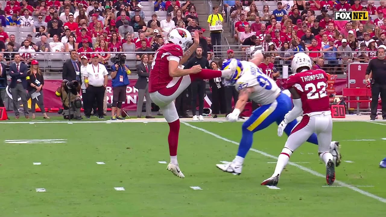 Los Angeles Rams defensive end Michael Hoecht reaches in to block the ...