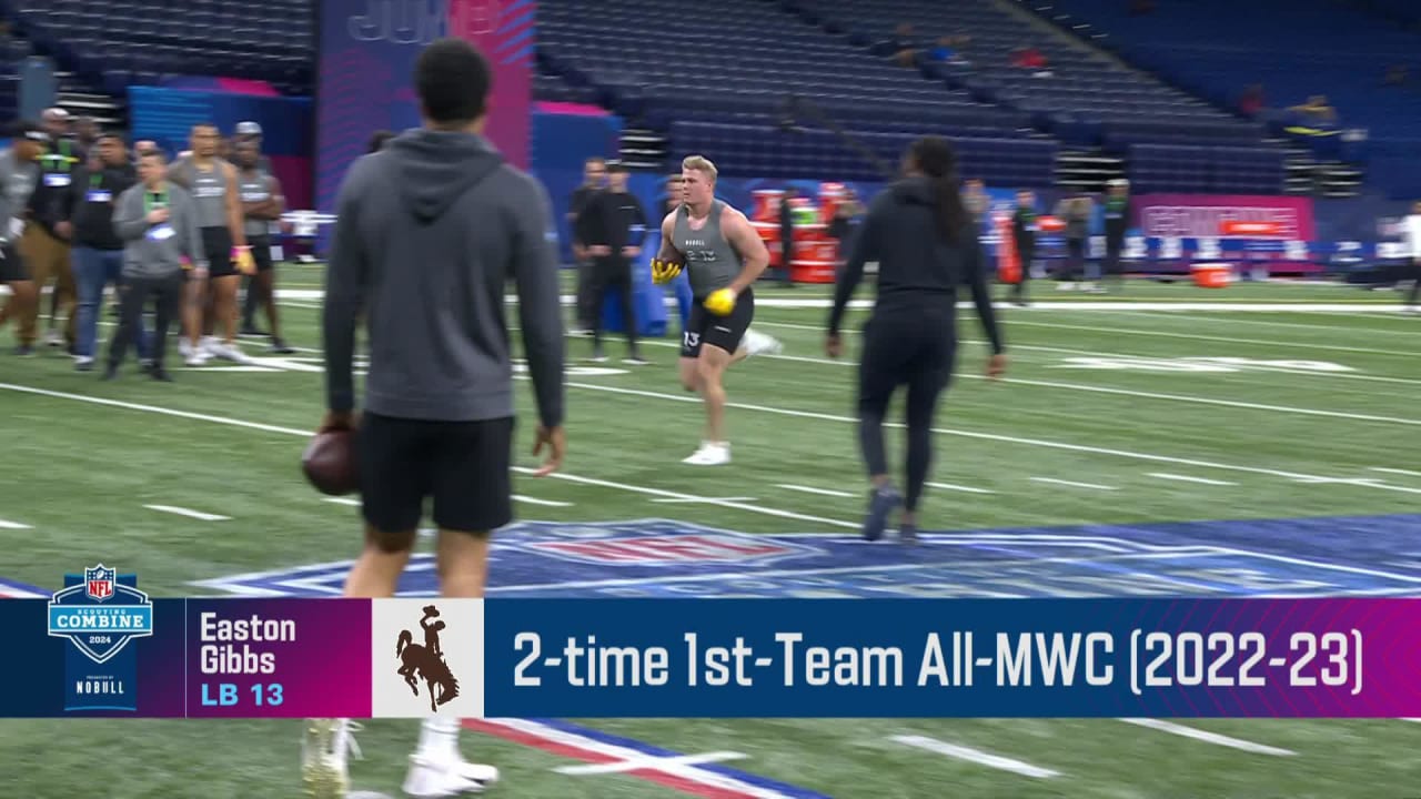 UCLA Bruins EDGE rusher Laiatu Latu stays around after defensive lineman drills to watch former ...