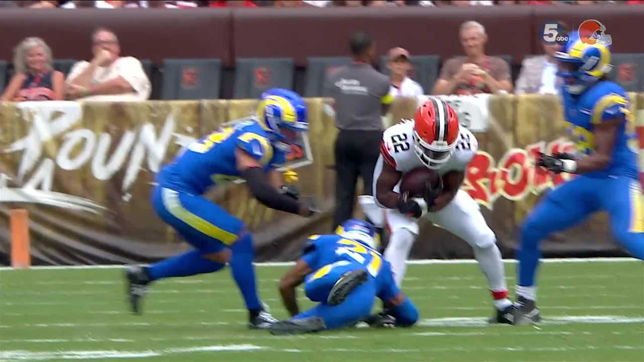 Cleveland Browns running back Dylan Sampson pinballs off a defender to ...