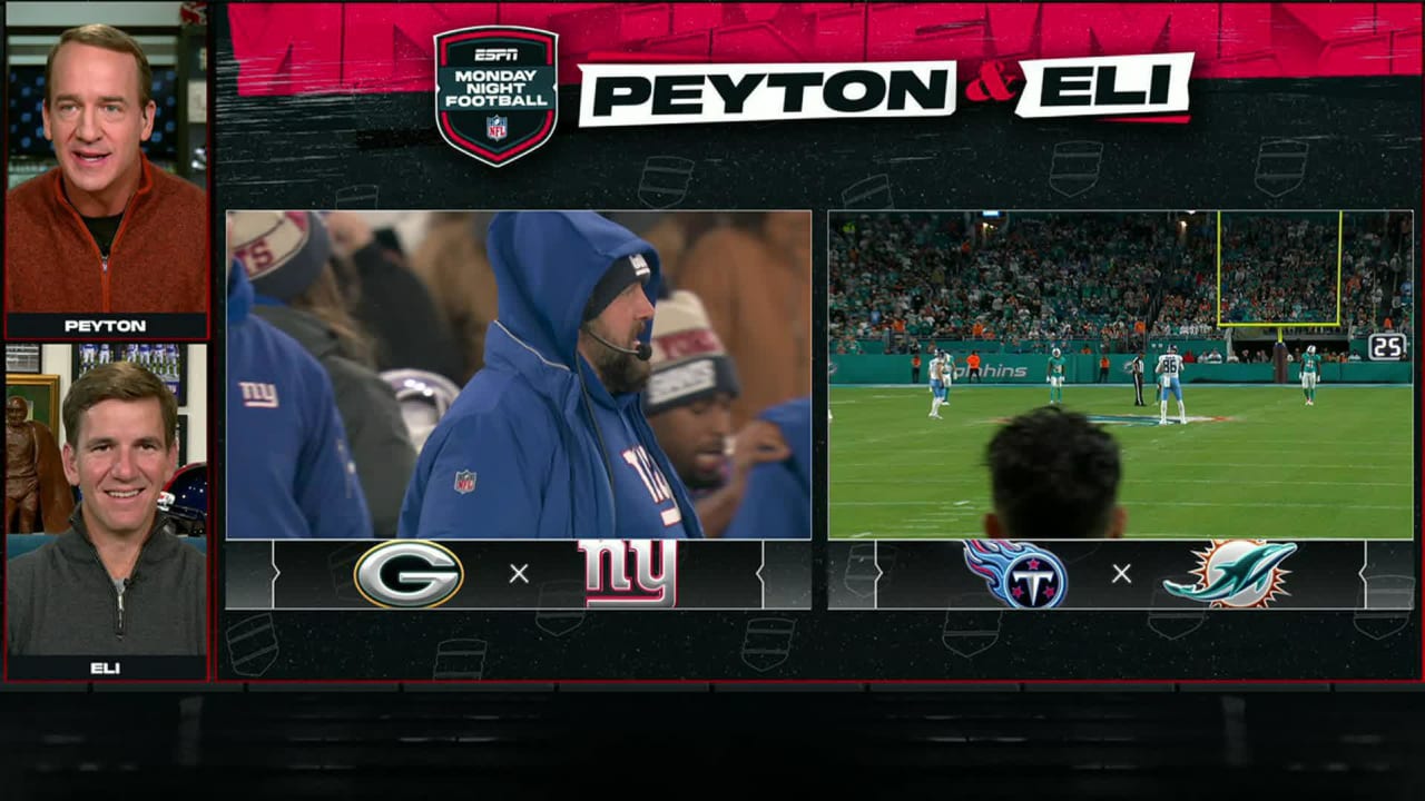 Peyton and Eli Manning react to the start of "Monday Night Football" doubleheader