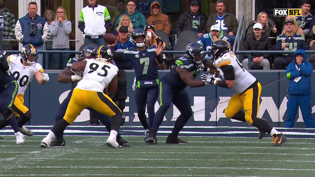 Seattle Seahawks quarterback Geno Smith steps up in pocket for 32-yard ...