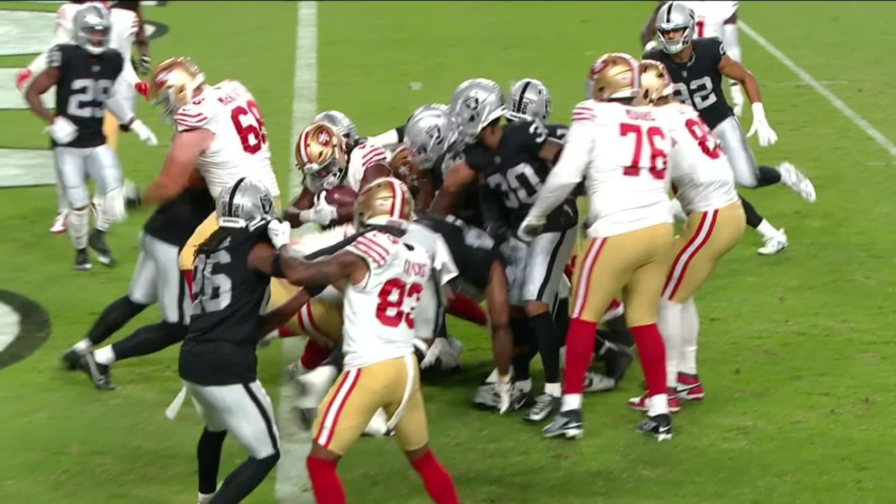 San Francisco 49ers running back Jordan Mason bulls his way through ...