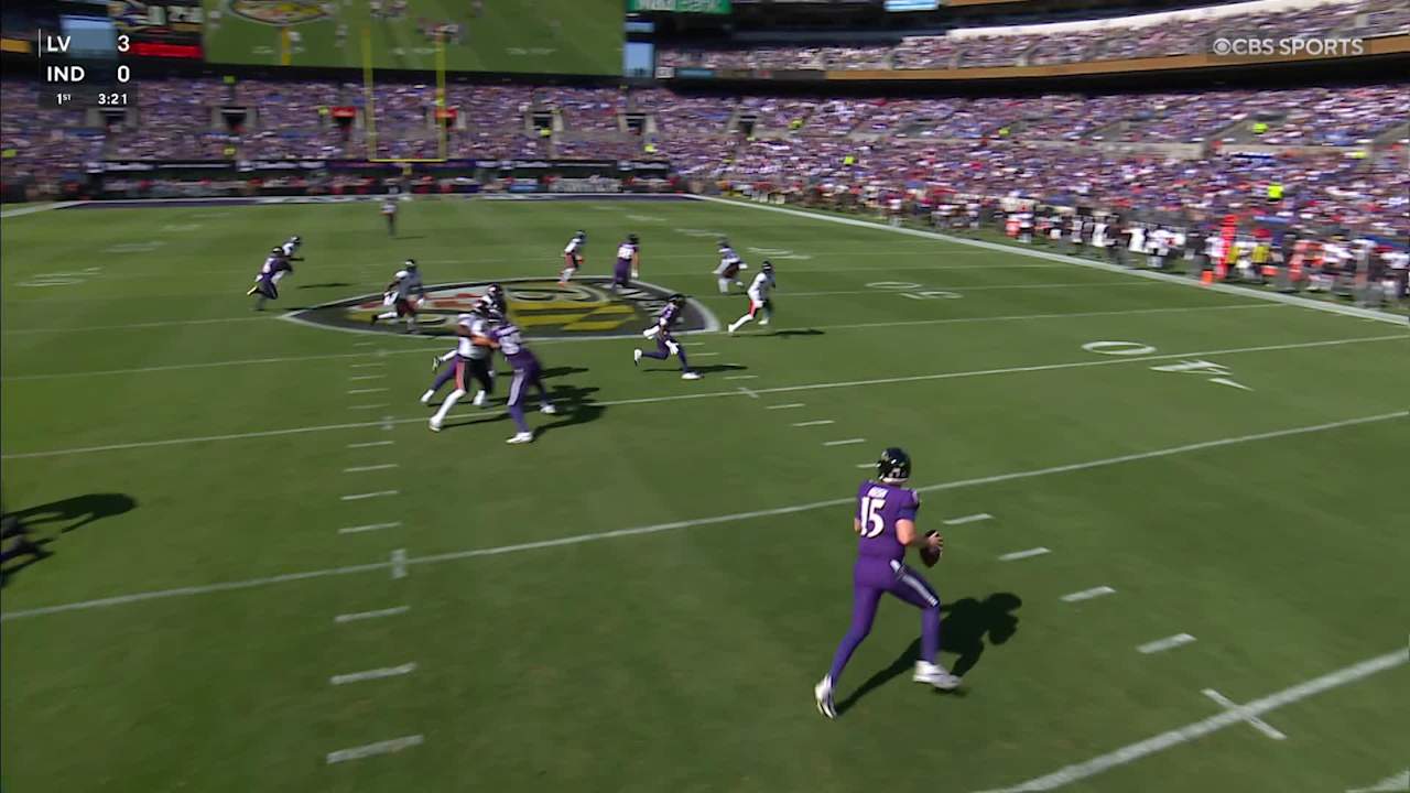 Baltimore Ravens quarterback Cooper Rush rolls out to connect with ...