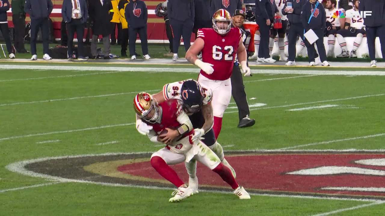 Chicago Bears defensive end Austin Booker sneaks up behind San ...