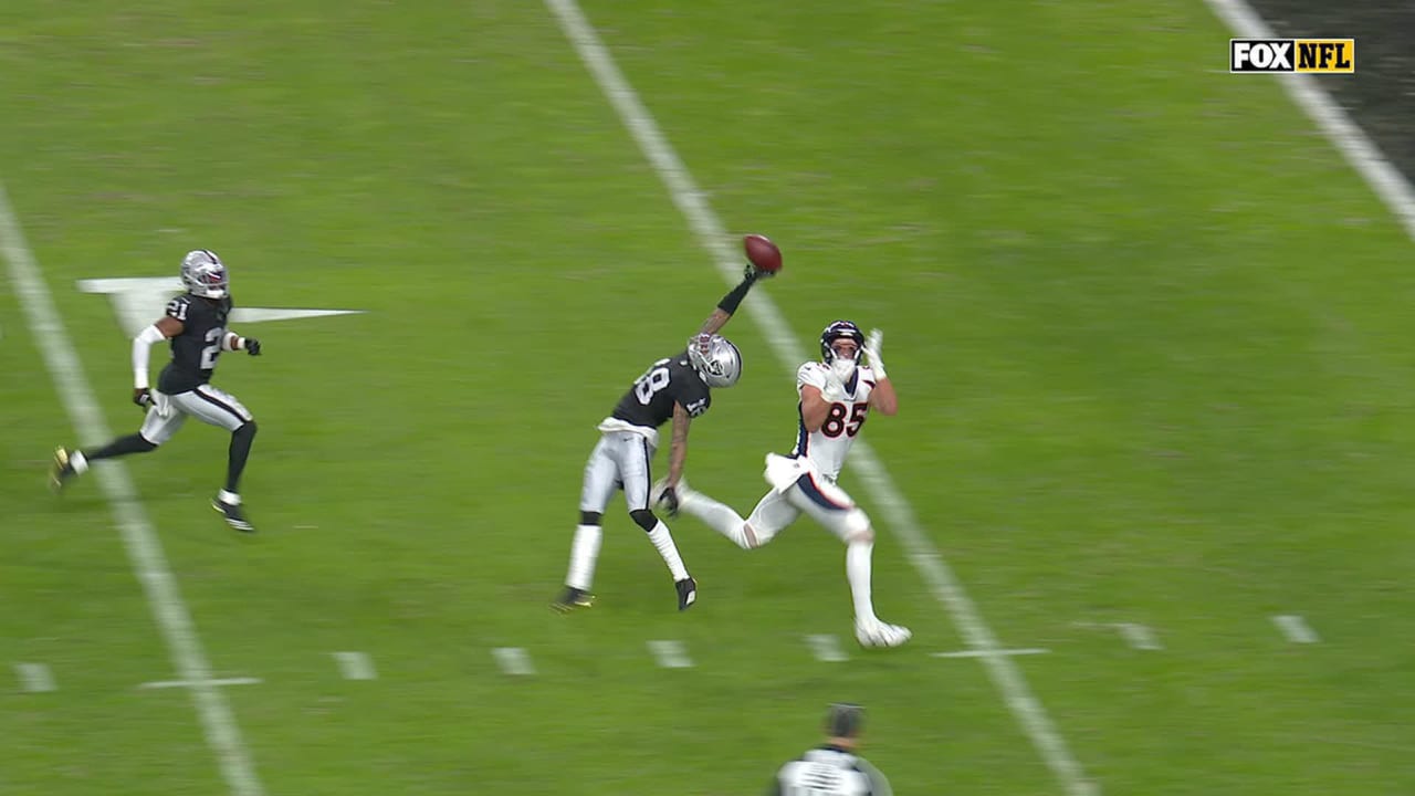 Las Vegas Raiders defensive back Jack Jones prevents Denver Broncos ...