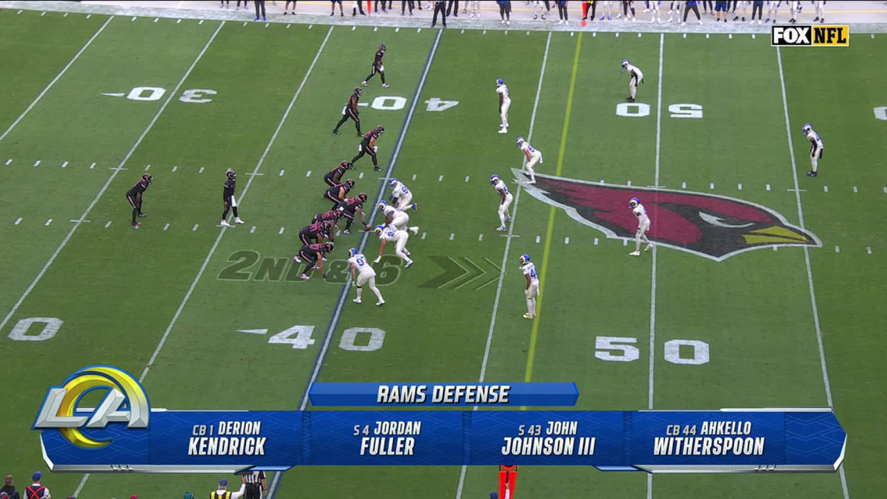 Los Angeles Rams rookie outside linebacker Byron Young contains a swing ...