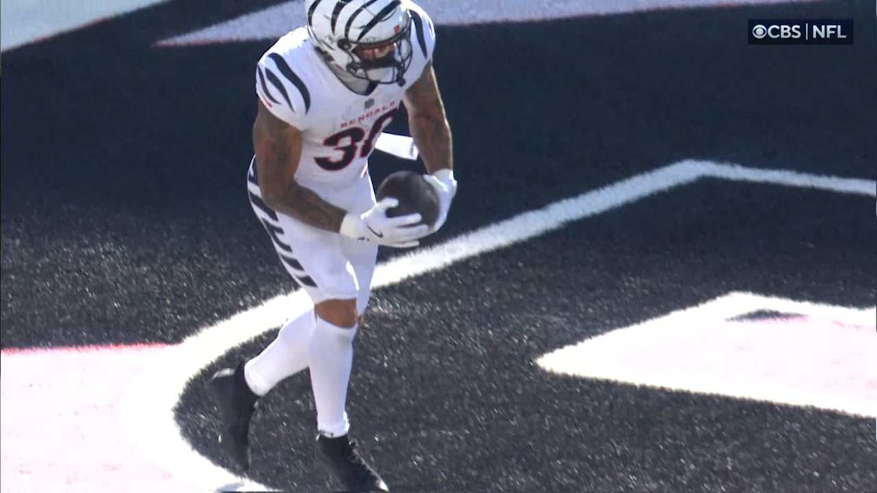 Cincinnati Bengals running back Chase Brown explodes through a hole for ...