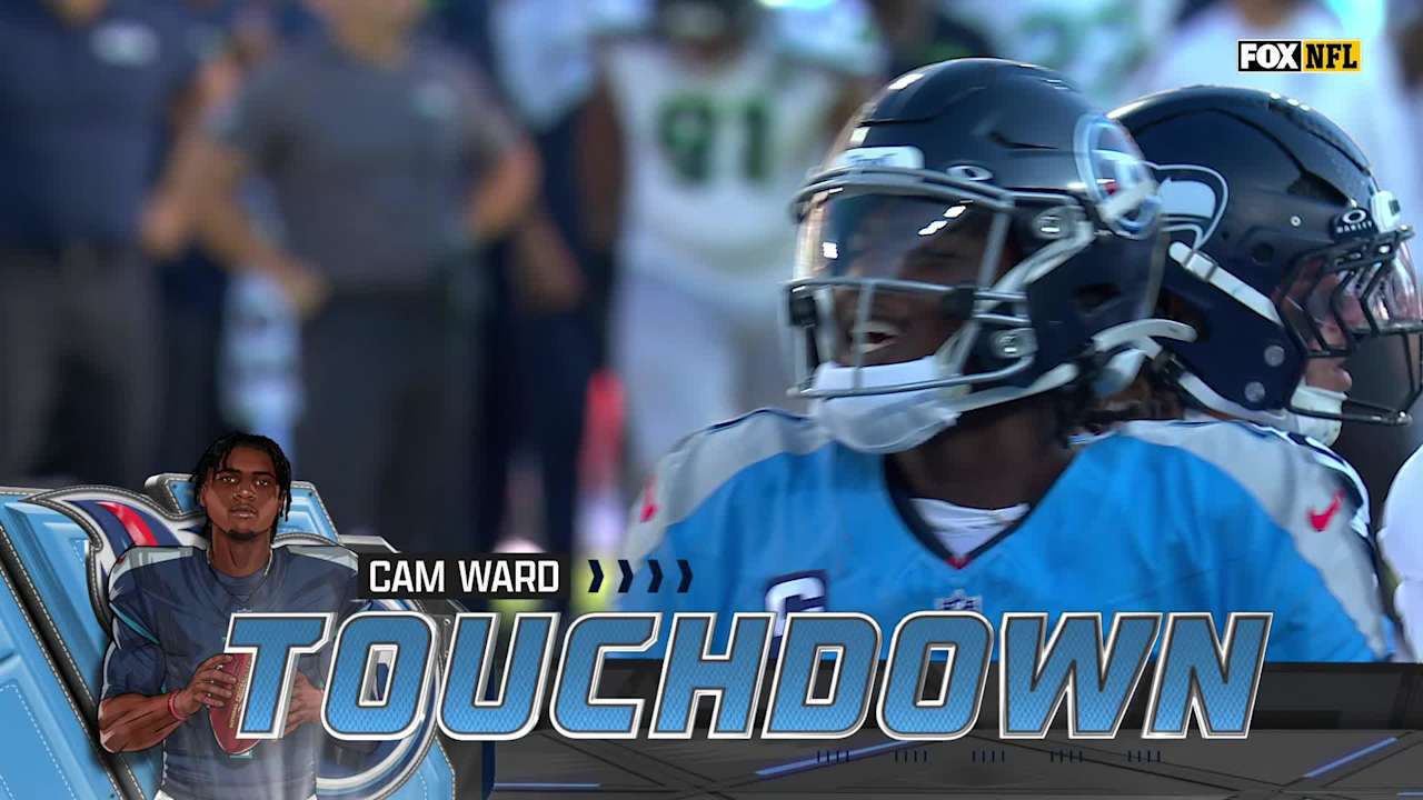 Tennessee Titans quarterback Cam Ward flies through the air for a 6 ...
