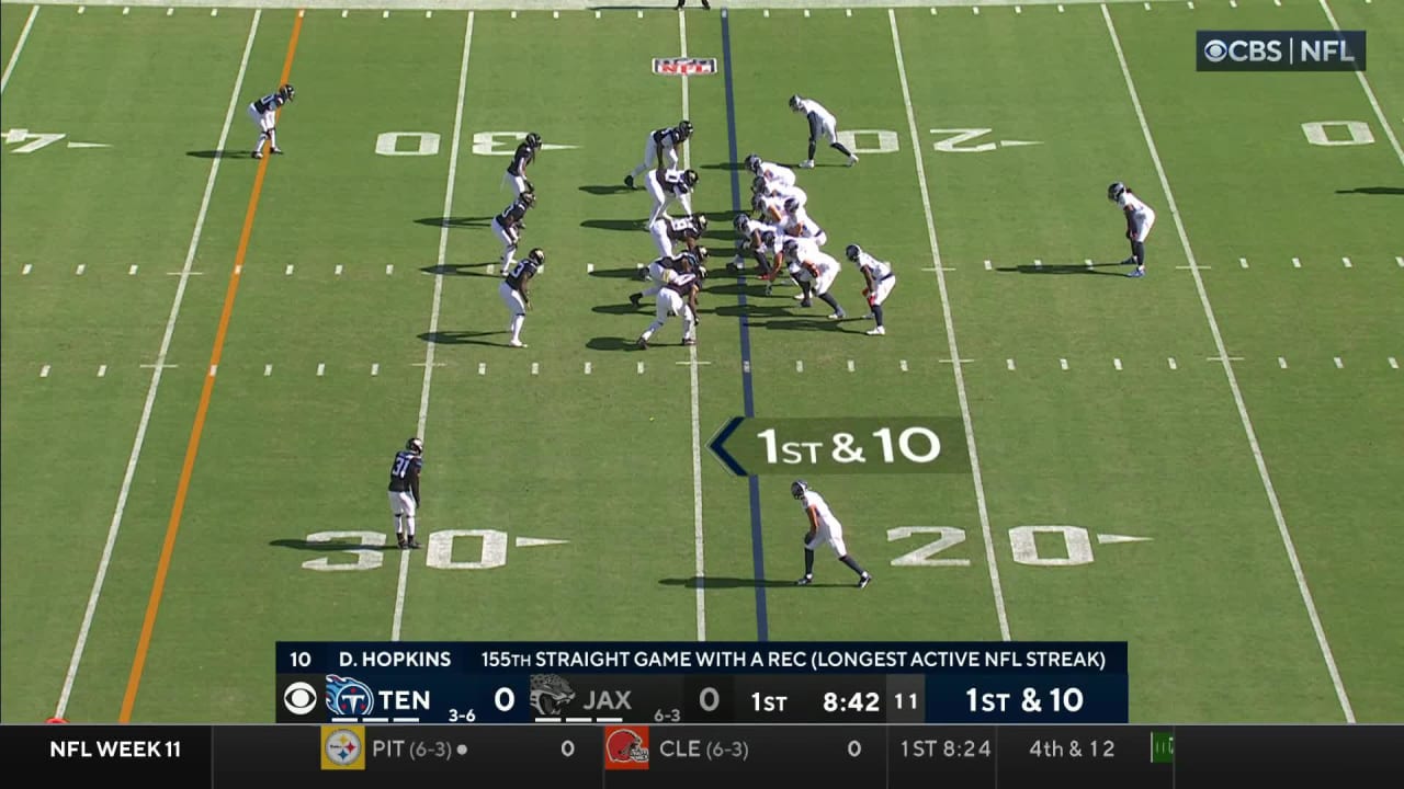 Tennessee Titans wide receiver Chris Moore speeds past Jacksonville ...