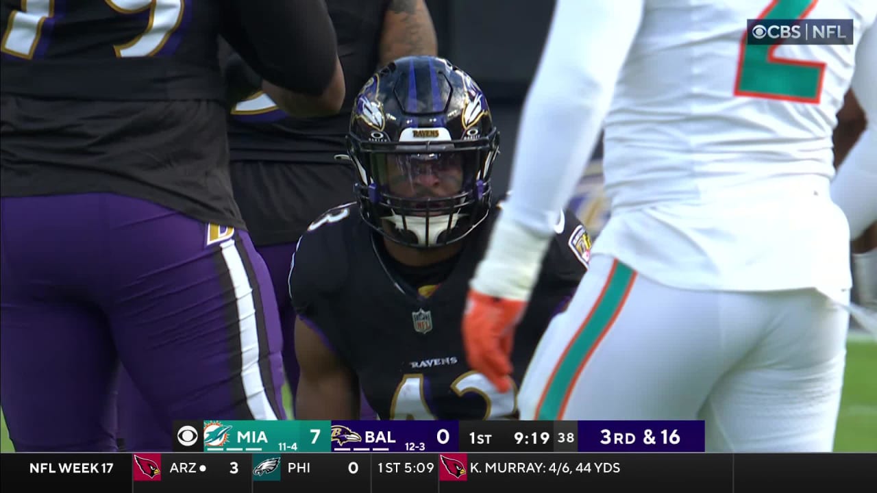 Baltimore Ravens running back Justice Hill follows his blockers for 18 ...