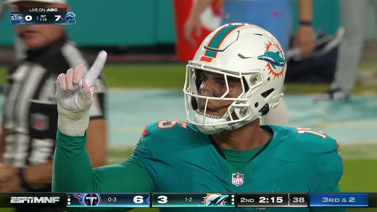 Miami Dolphins linebacker Jaelan Phillips wags his finger after batting ...