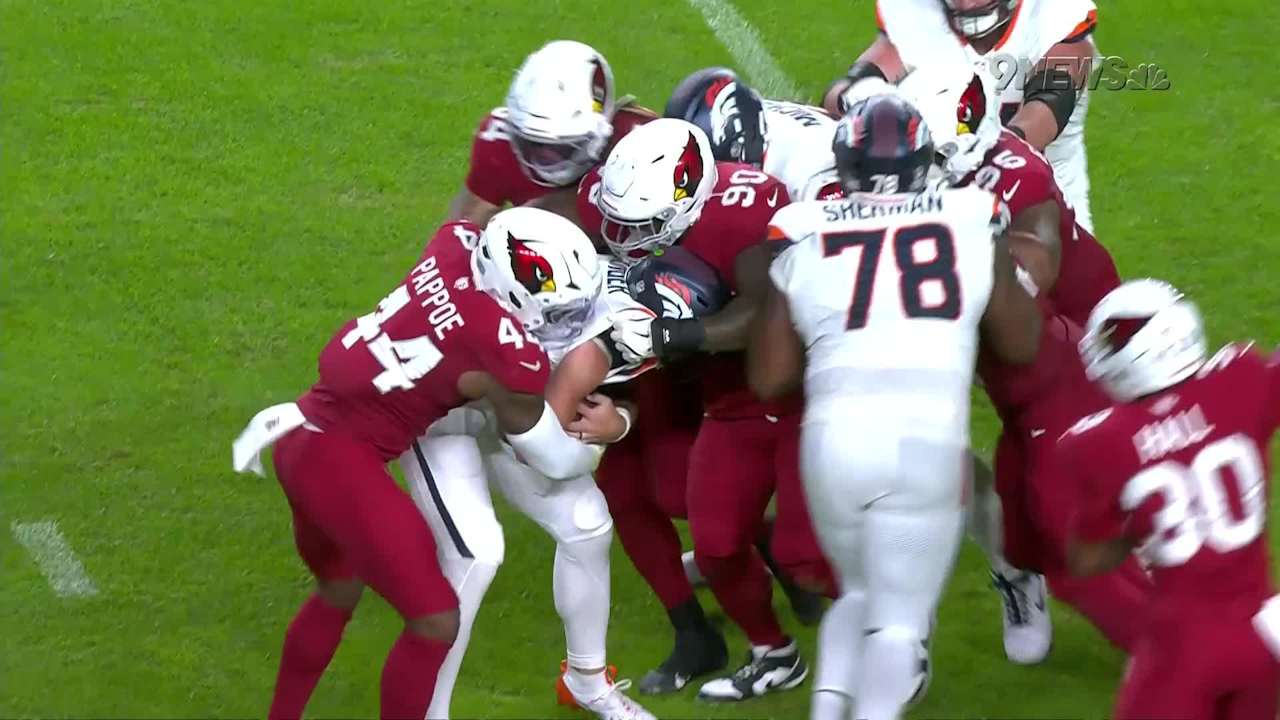 Arizona Cardinals surround Denver Broncos quarterback Sam Ehlinger on ...