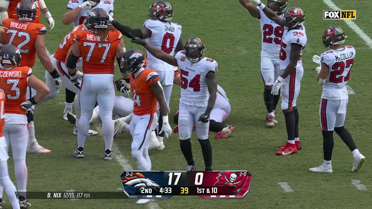 Tampa Bay Buccaneers defensive end Logan Hall grabs fumble by Broncos for Buccaneers takeaway