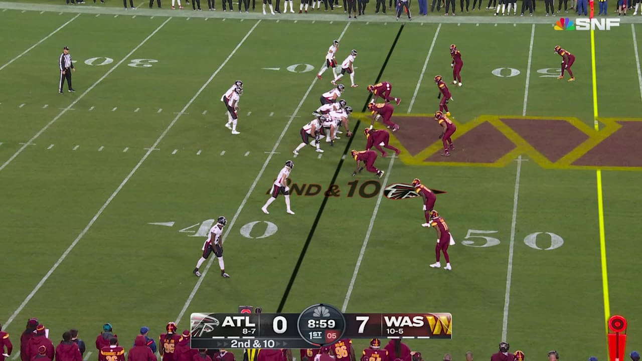 Atlanta Falcons tight end Kyle Pitts uses a stiff-arm to spring 23-yard ...