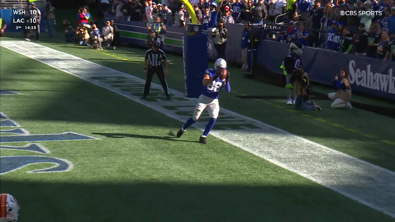 Seattle Seahawks quarterback Sam Darnold's touchdown pass to tight end ...