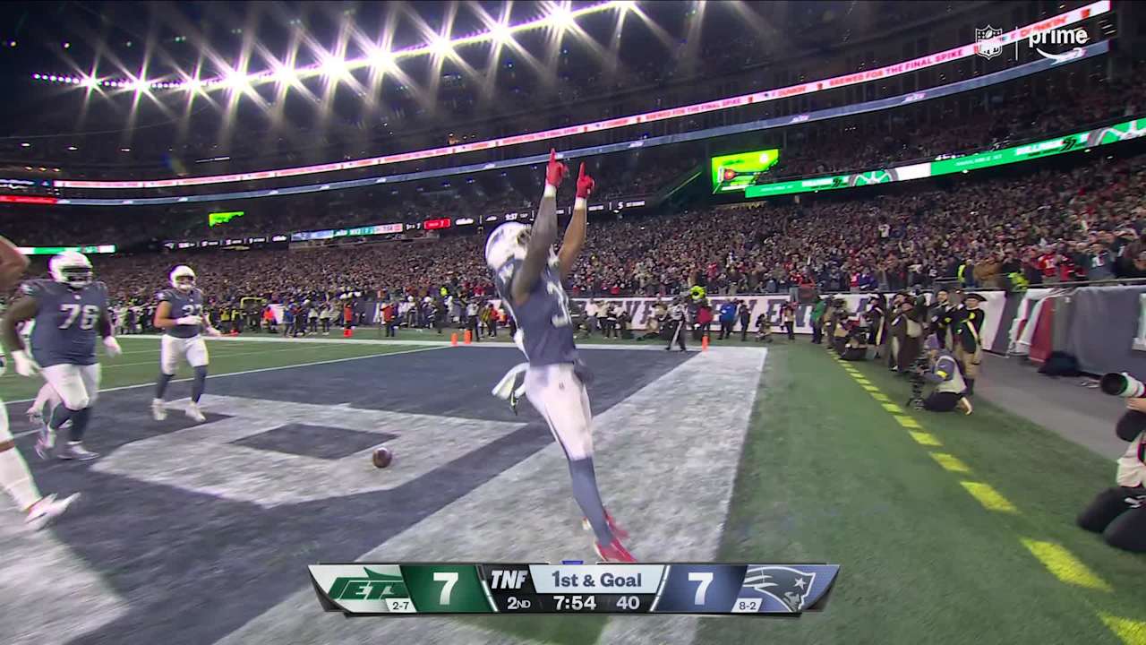 New England Patriots running back TreVeyon Henderson scores his second ...