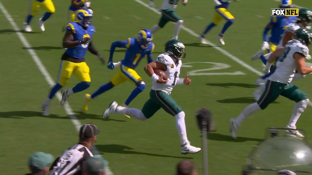 Philadelphia Eagles quarterback Jalen Hurts uses his legs on 4th down ...