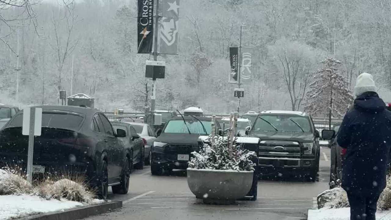 New England Patriots wide receiver Stefon Diggs arrives in the snow to ...