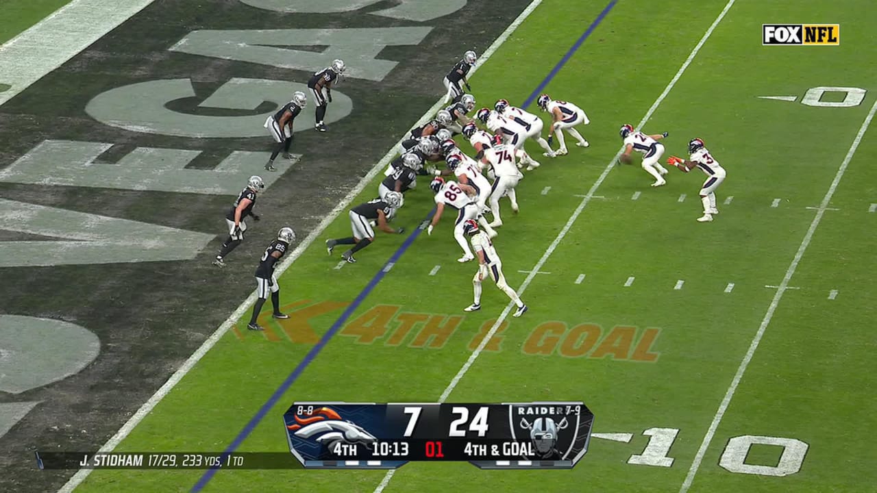 Denver Broncos running back Javonte Williams takes direct snap into the ...