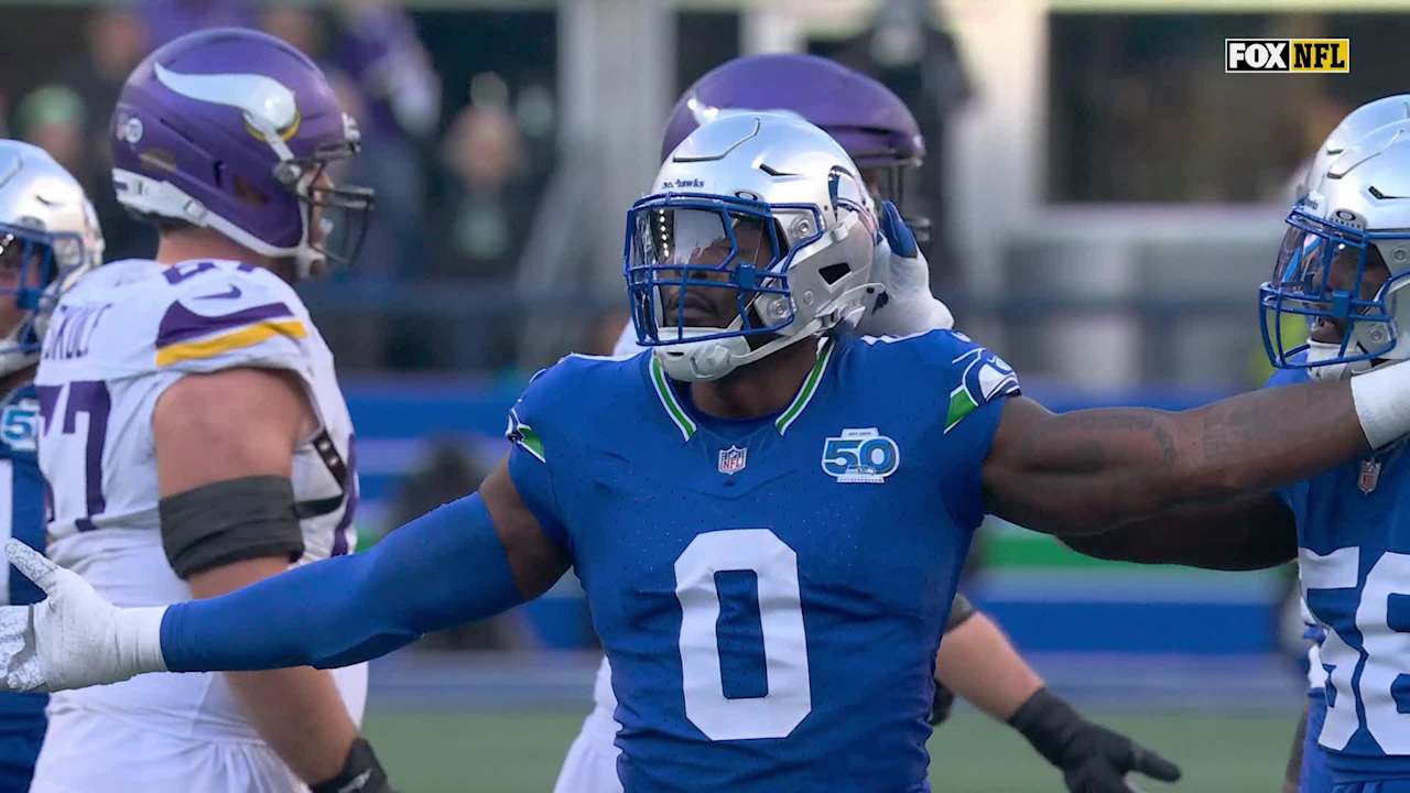 Seattle Seahawks defensive end DeMarcus Lawrence drives Minnesota ...