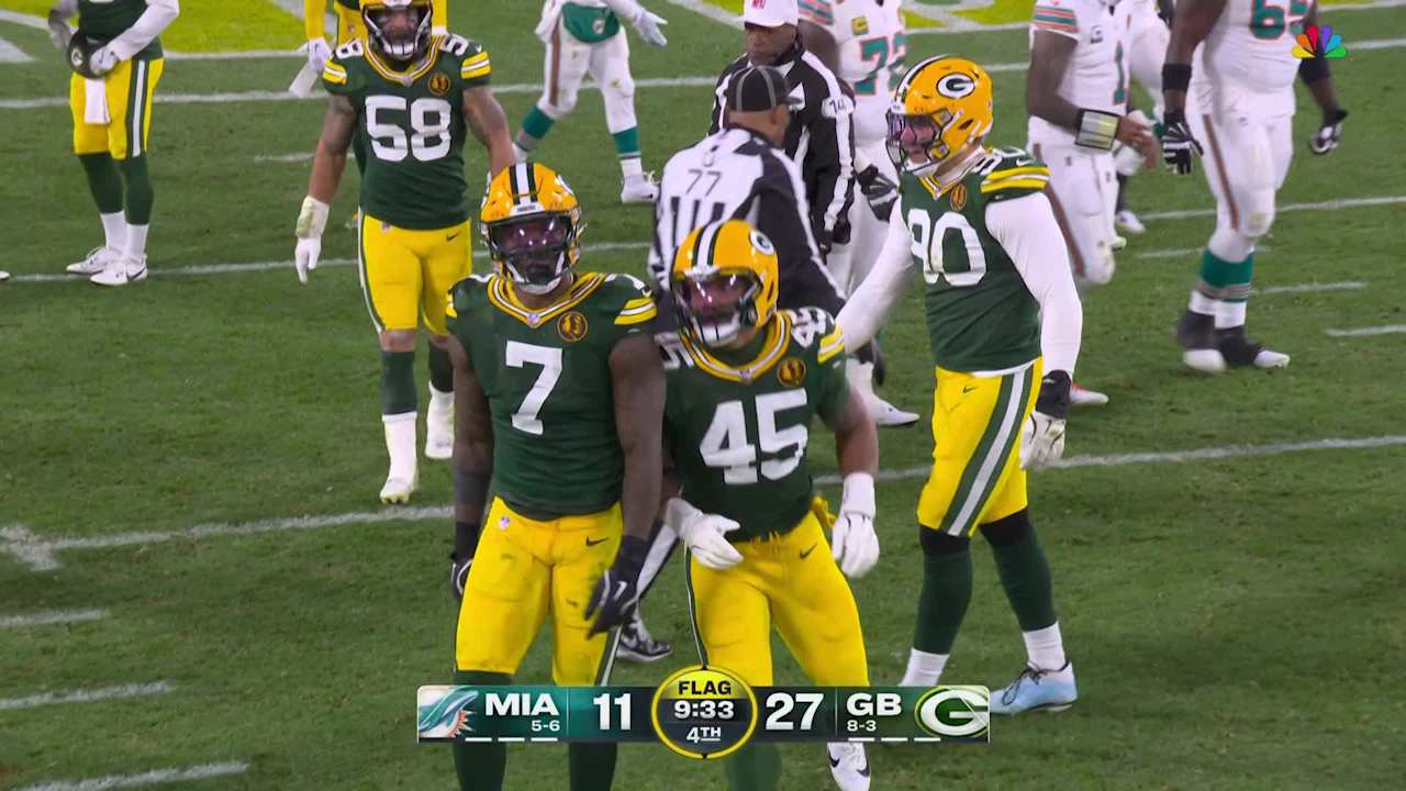 Green Bay Packers linebacker Quay Walker swallows up Miami Dolphins quarterback Tua Tagovailoa ...