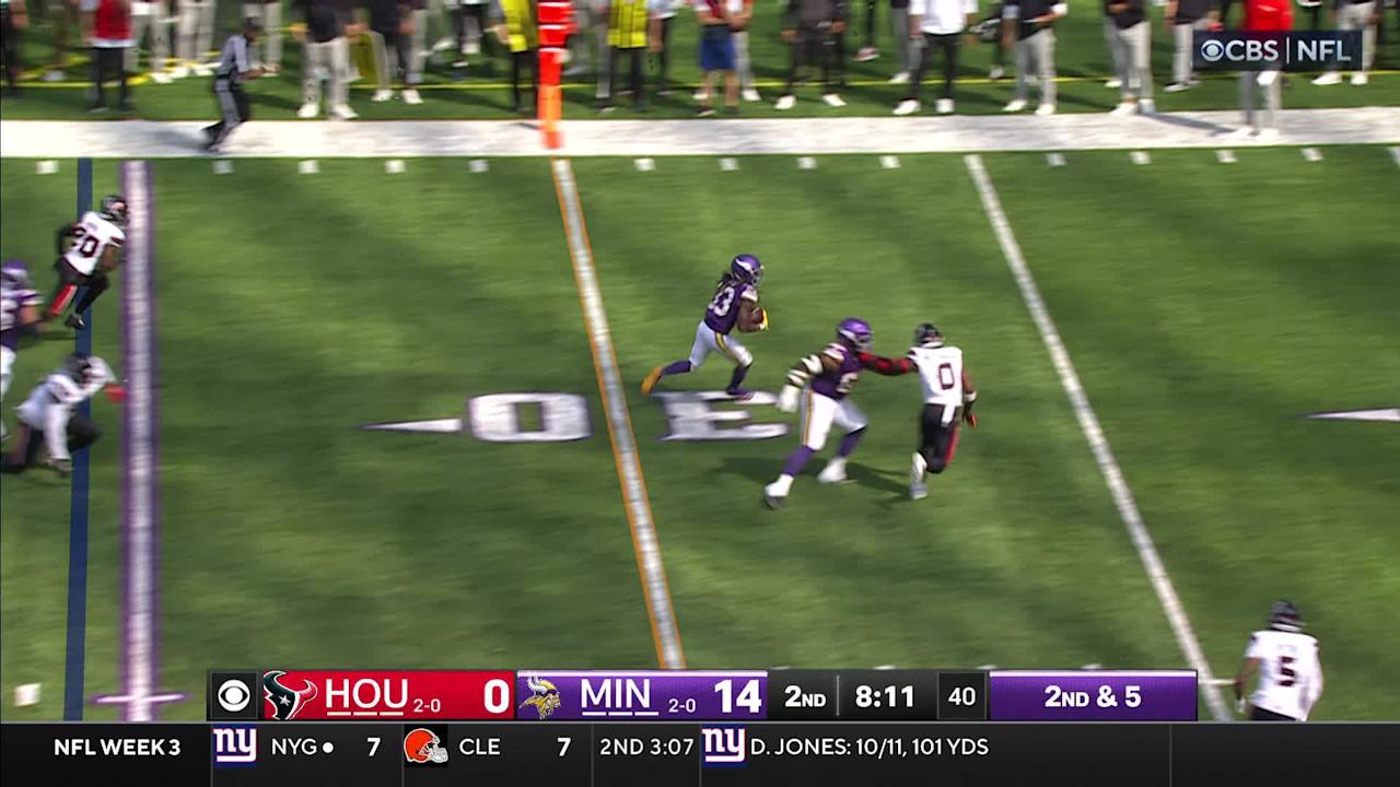 Minnesota Vikings running back Aaron Jones scampers up the sideline for ...