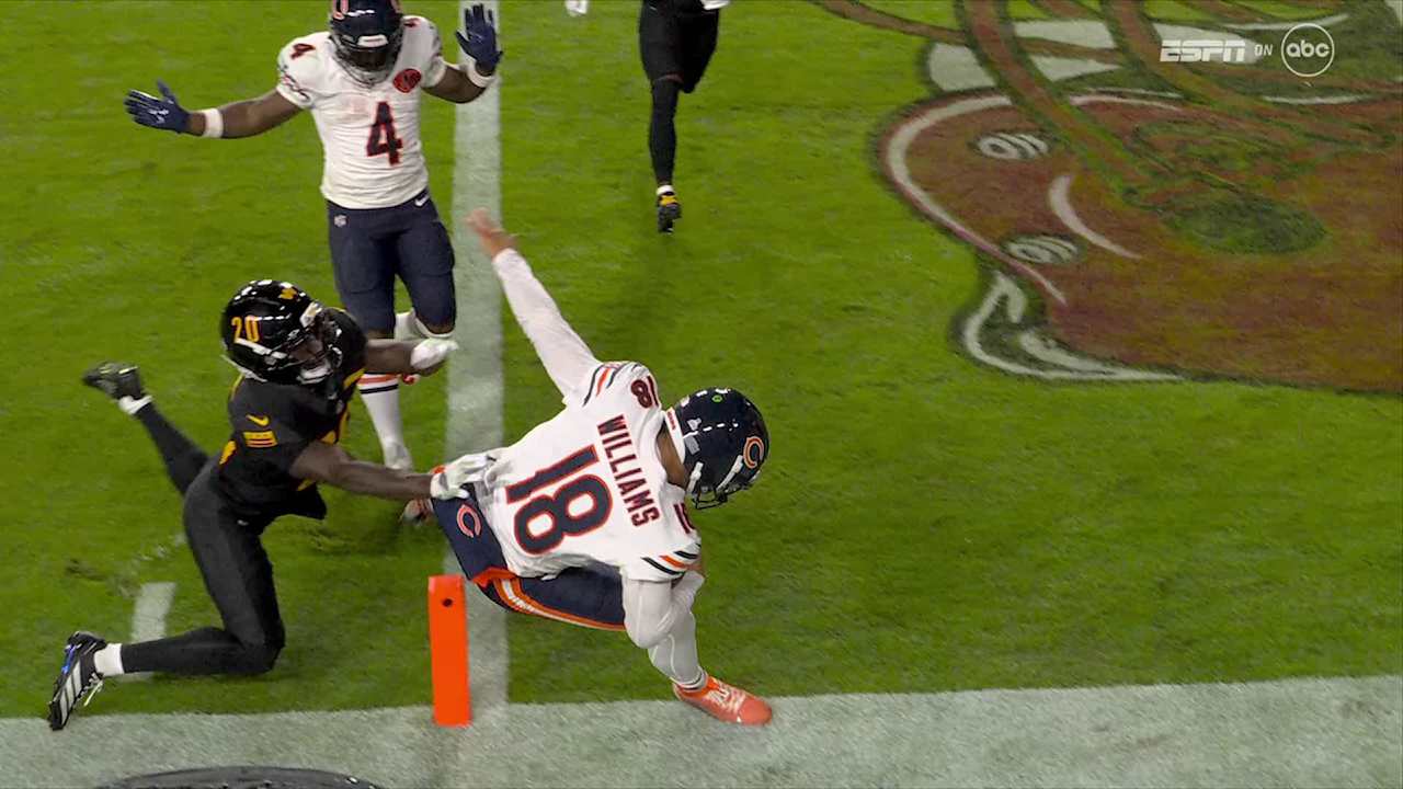 Chicago Bears quarterback Caleb Williams goes flying after notching a ...