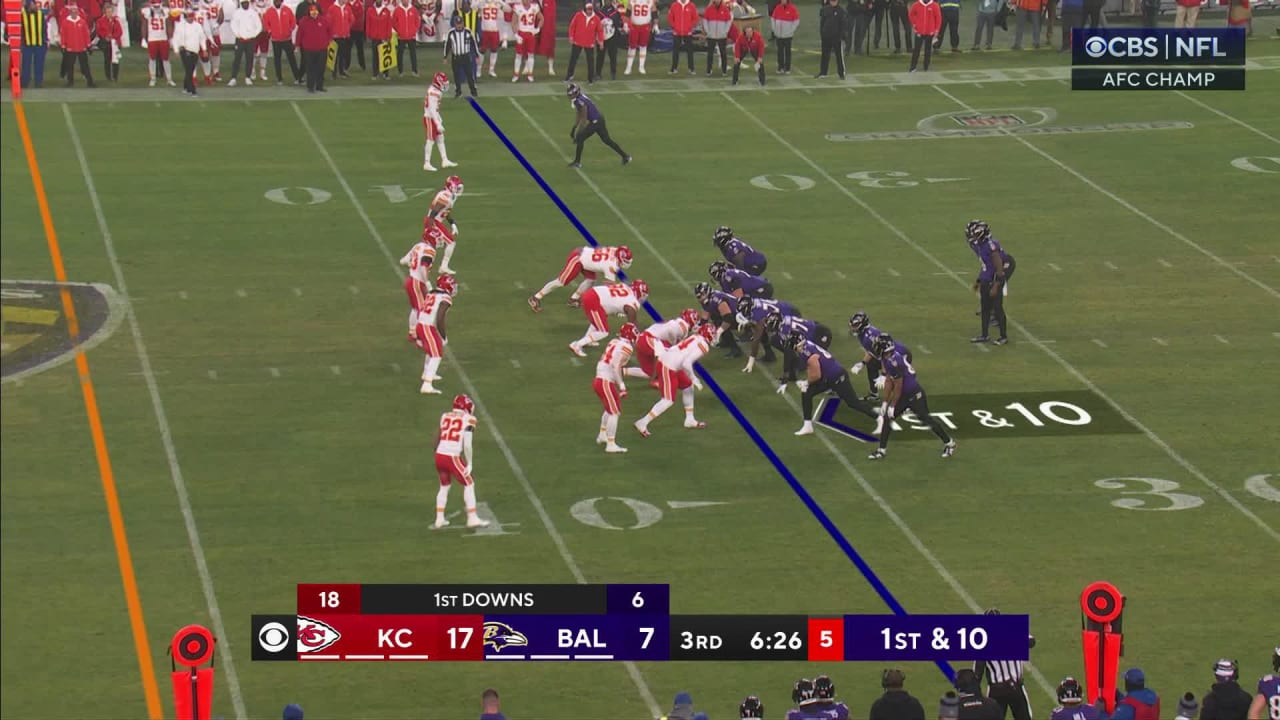 Baltimore Ravens quarterback Lamar Jackson turns a collapsing pocket ...