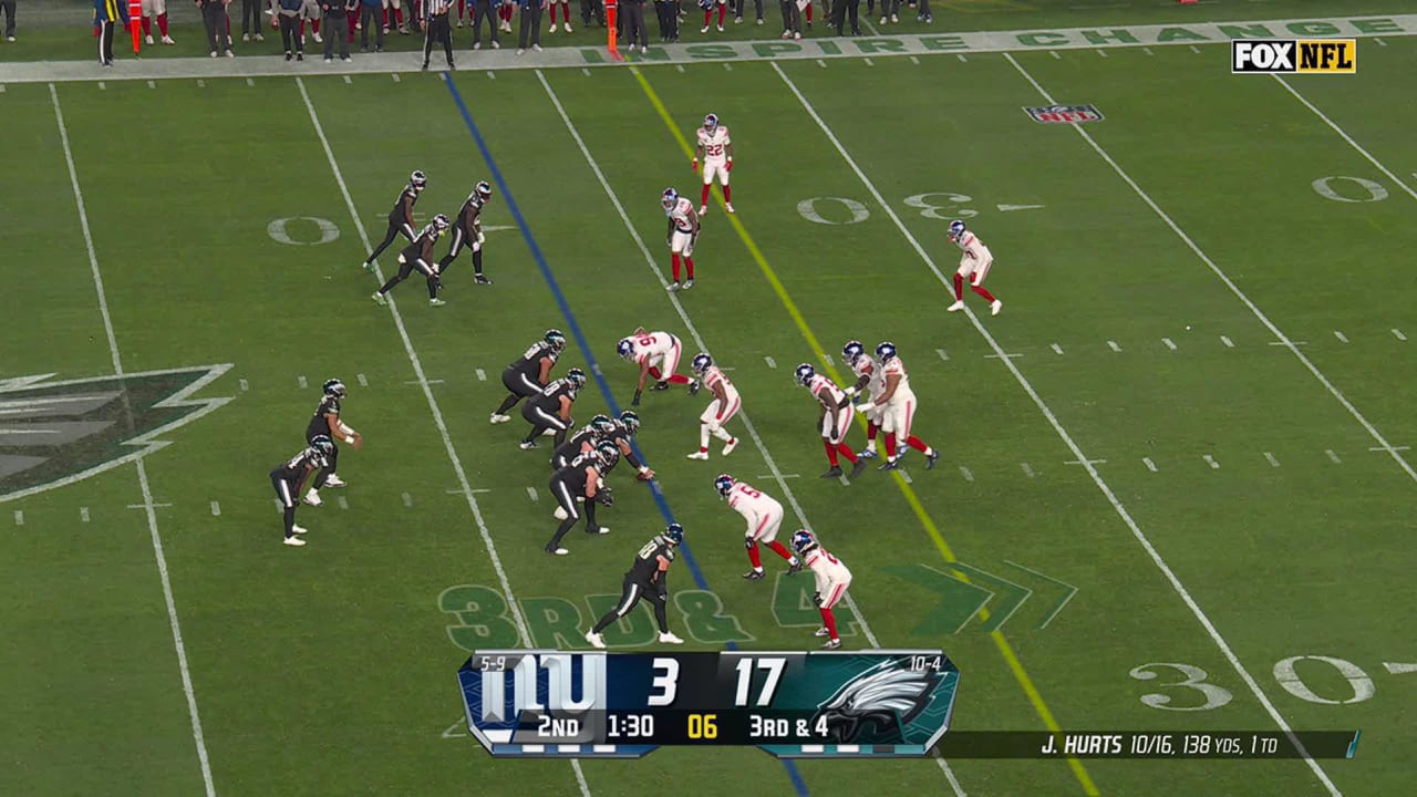 Philadelphia Eagles quarterback Jalen Hurts absorbs New York Giants cornerback Deonte Banks' hit ...