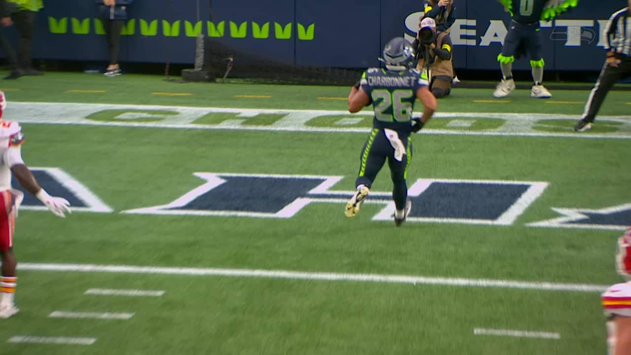 Running back Zach Charbonnet's untouched 15-yard TD run opens scoring ...