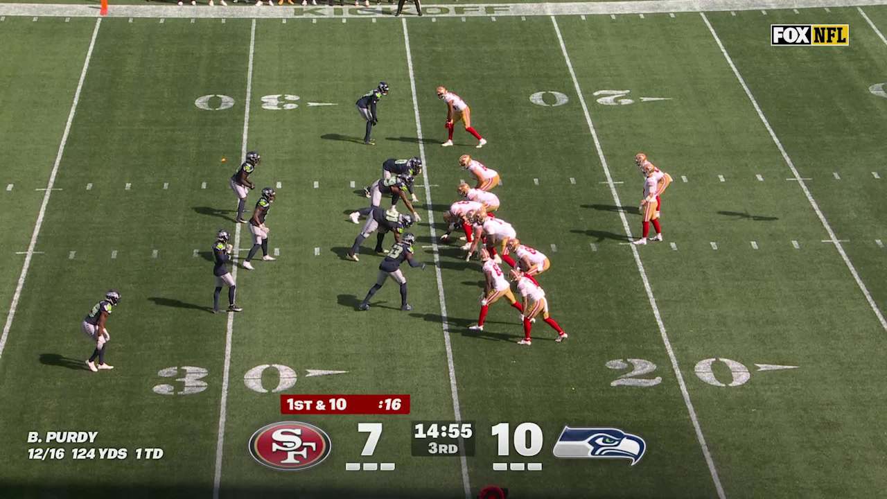 San Francisco 49ers' running back Christian McCaffrey gains 26 yards on ...