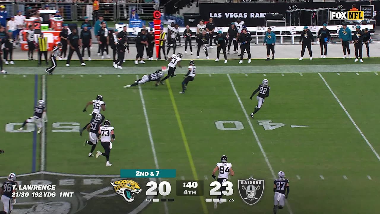Jacksonville Jaguars wide receiver Tim Jones slips up sideline for a 15 ...