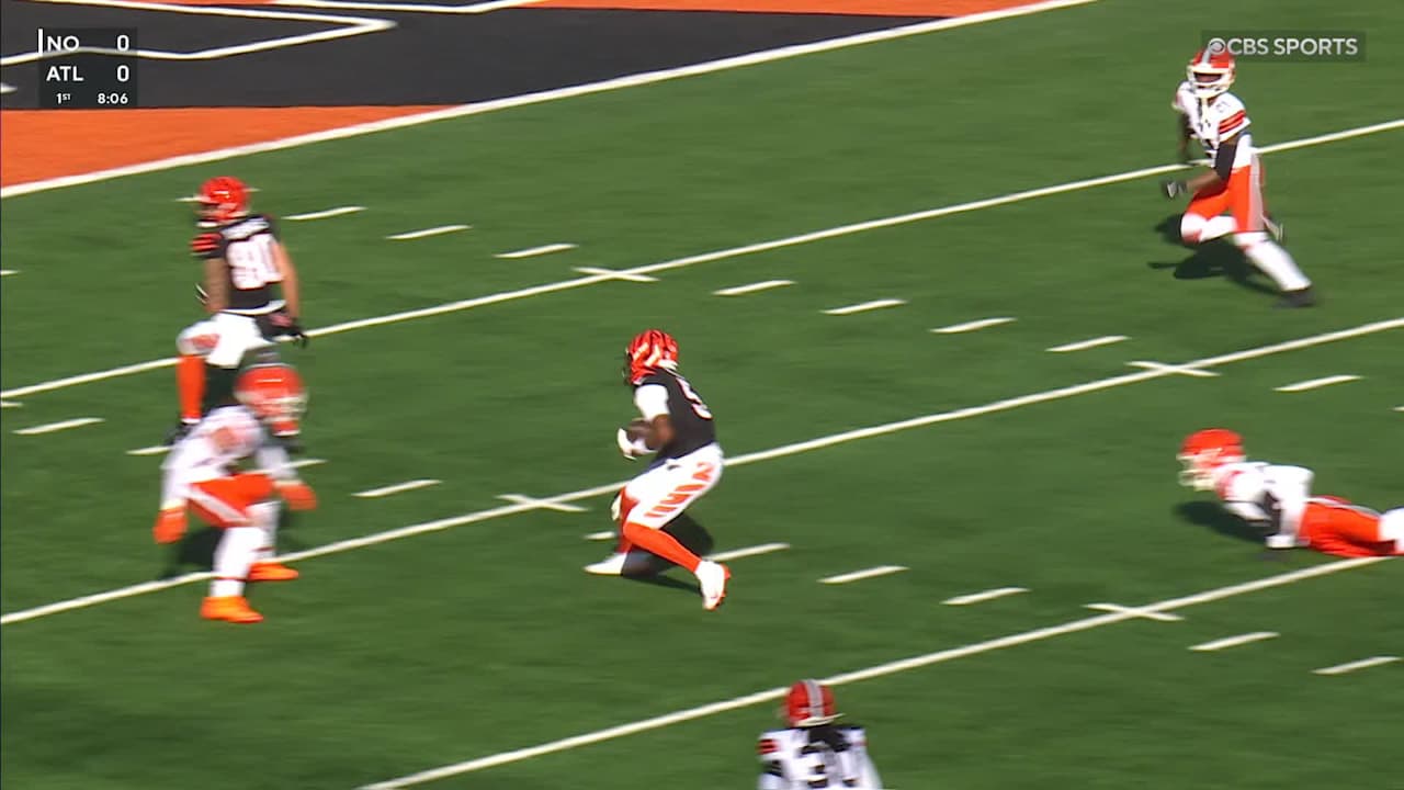 Cincinnati Bengals wide receiver Tee Higgins stumbles his way inside ...