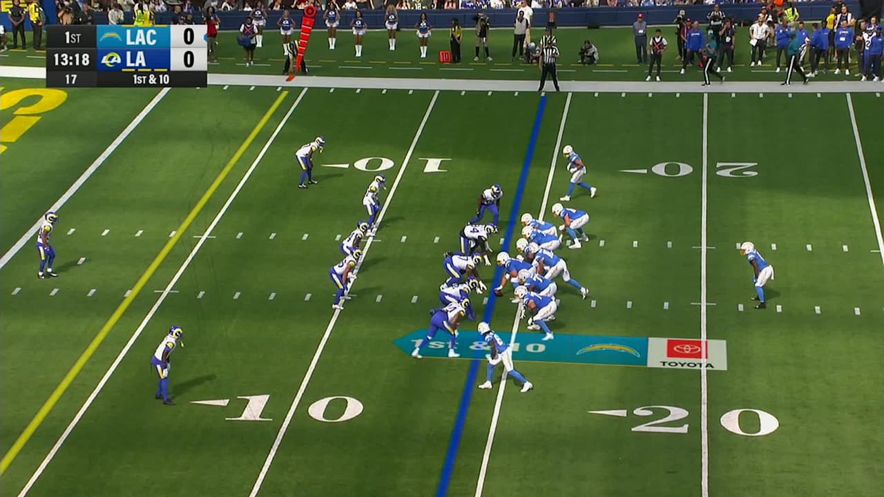 Los Angeles Rams outside linebacker Brennan Jackson wrangles a ...