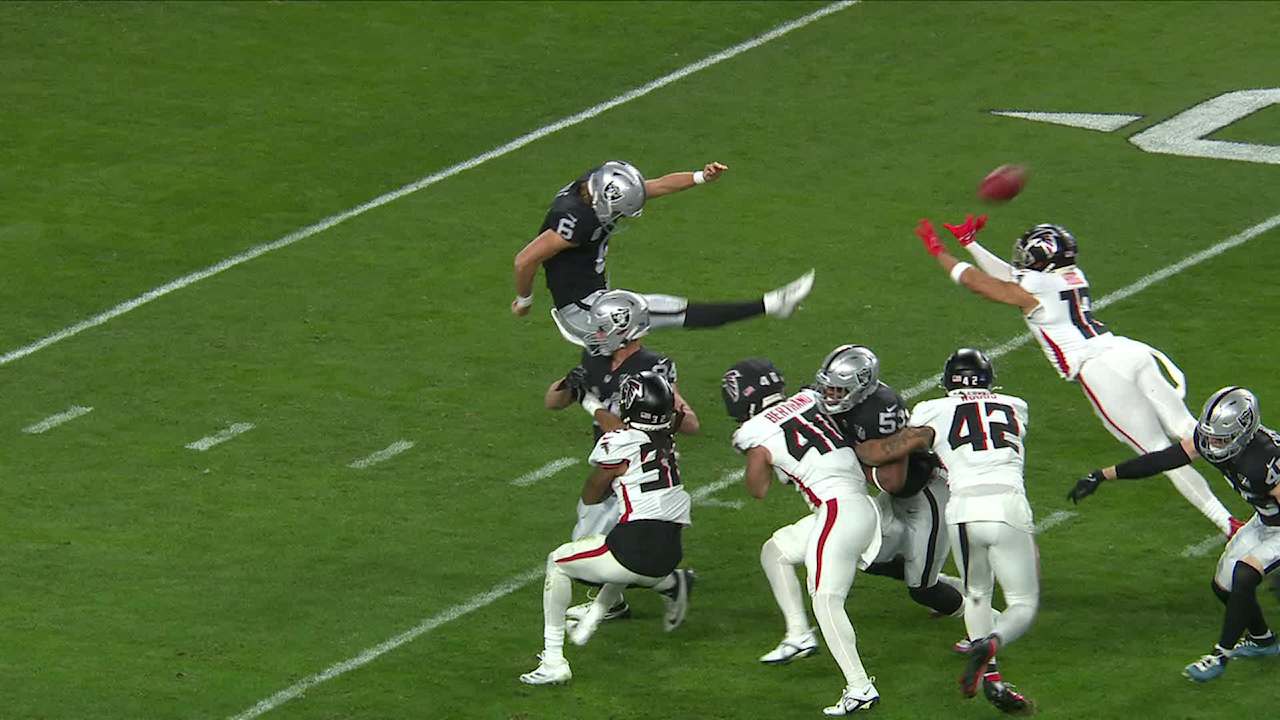 Atlanta Falcons wide receiver KhaDarel Hodge records a partial punt ...