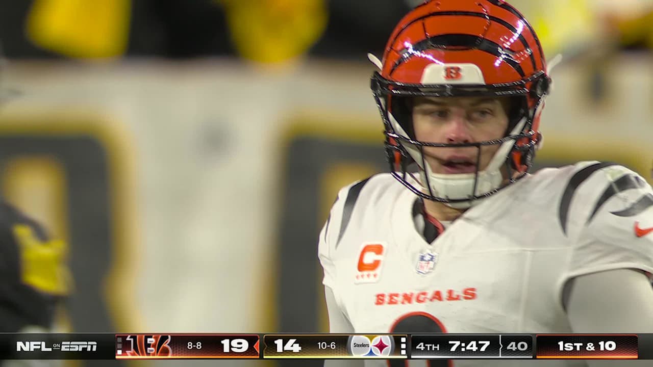 Cincinnati Bengals quarterback Joe Burrow evades pass rush prior to ...