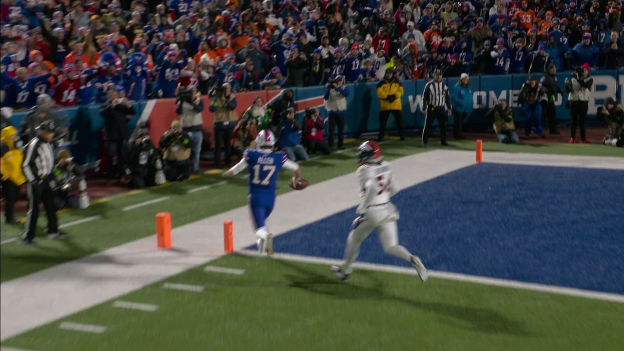 Buffalo Bills quarterback Josh Allen wins the race to the pylon for a 6-yard touchdown vs ...