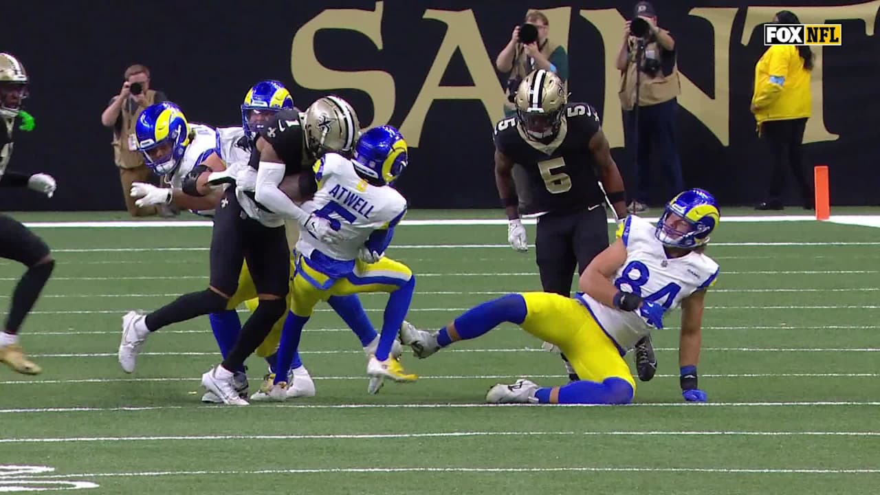 New Orleans Saints defensive back Alontae Taylor bursts through two Los ...