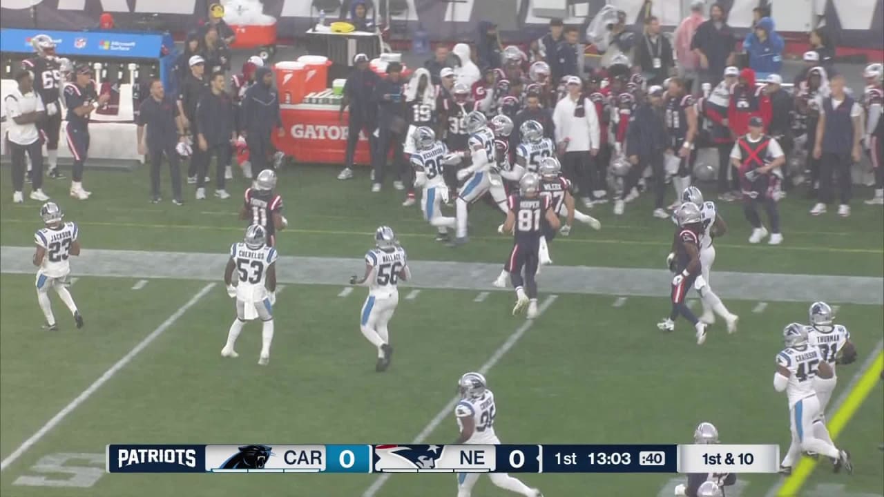 New England Patriots running back Rhamondre Stevenson puts his stiff ...