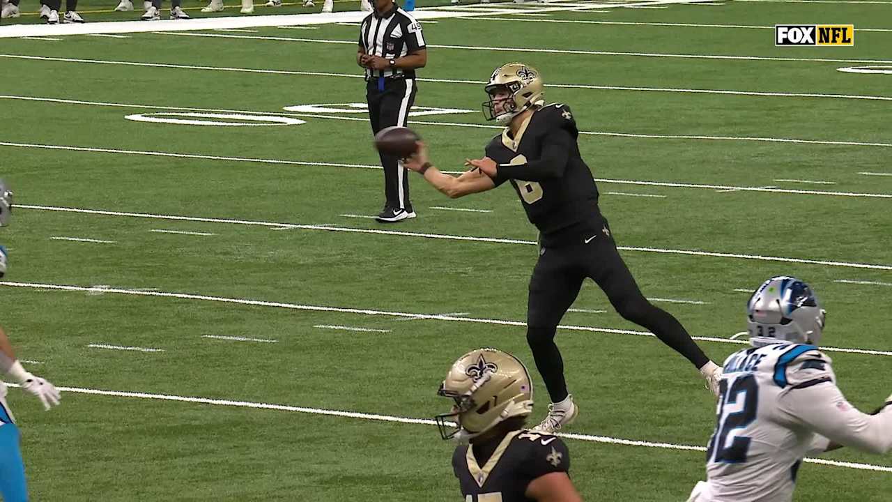 New Orleans Saints quarterback quarterback Tyler Shough fires side-arm ...