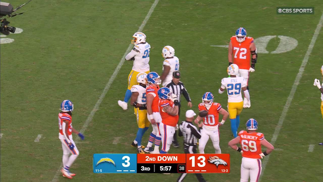 Los Angeles Chargers defensive tackle Justin Eboigbe piggybacks Denver ...