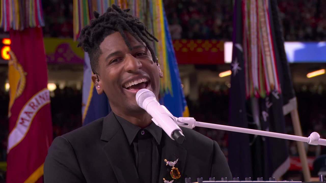 Singer and songwriter Jon Batiste performs the national anthem at Super ...