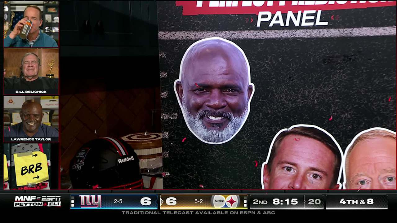 Hall of Fame linebacker Lawrence Taylor bull-rushes his way to the ...